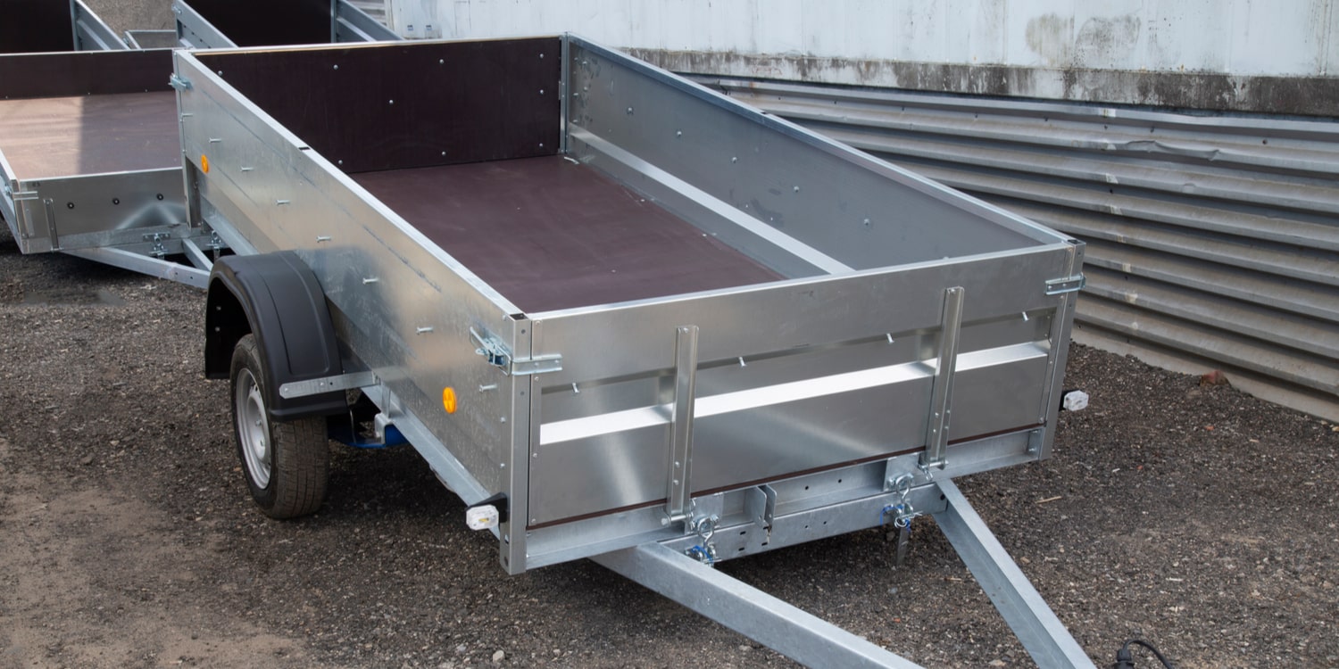 Spray On vs Drop In Trailer Liner | Eric's Rhino Linings